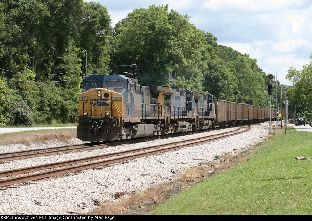 CSX 54, 67, and 7894 roll a line of hoppers EB